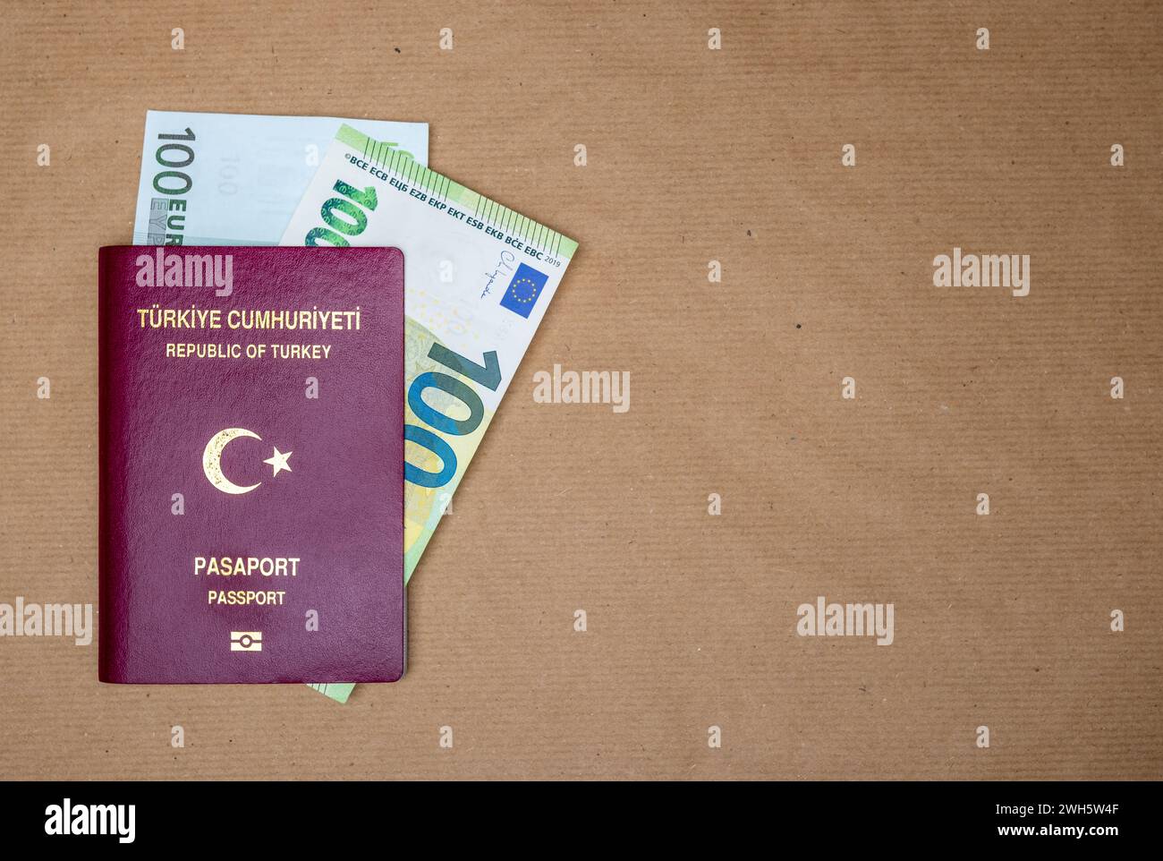 Passport and banknotes standing isolated on the background. Turkish ...