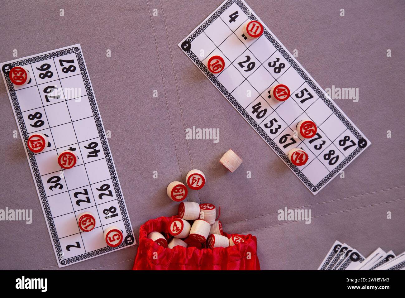 Classic Bingo Game with Wooden Numbers in Sunlight Stock Photo - Alamy