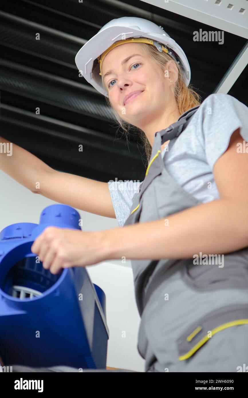 Installation of a new air conditioning unit hi-res stock photography ...