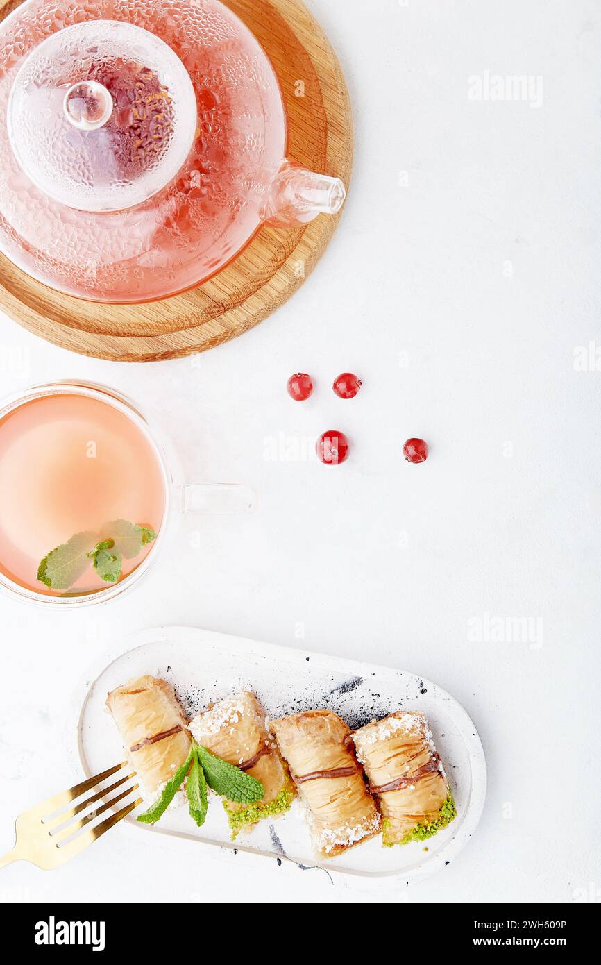 Traditional turkish dessert baklava and natural healthy cranberry tea ...