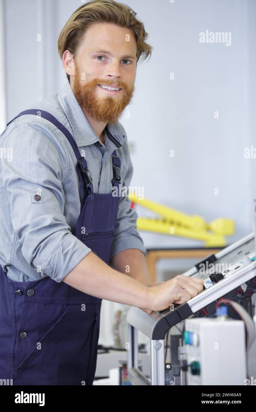 Male hand controls cnc machine hi-res stock photography and images - Alamy