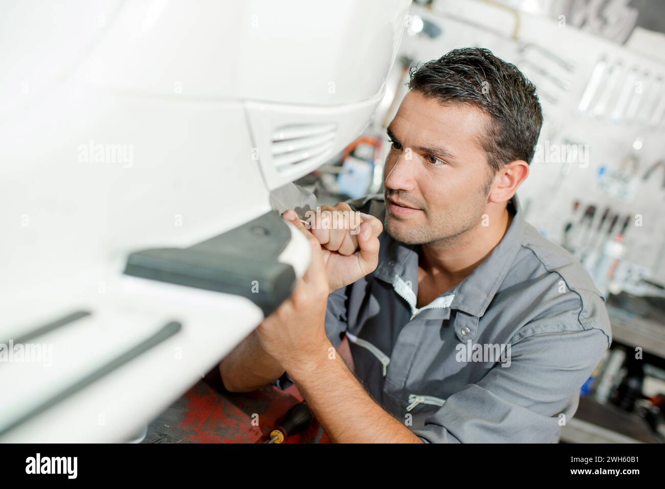 Rear view male auto mechanic hi-res stock photography and images - Alamy