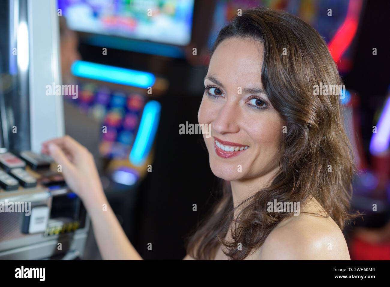 Woman playing on machines hi-res stock photography and images - Alamy