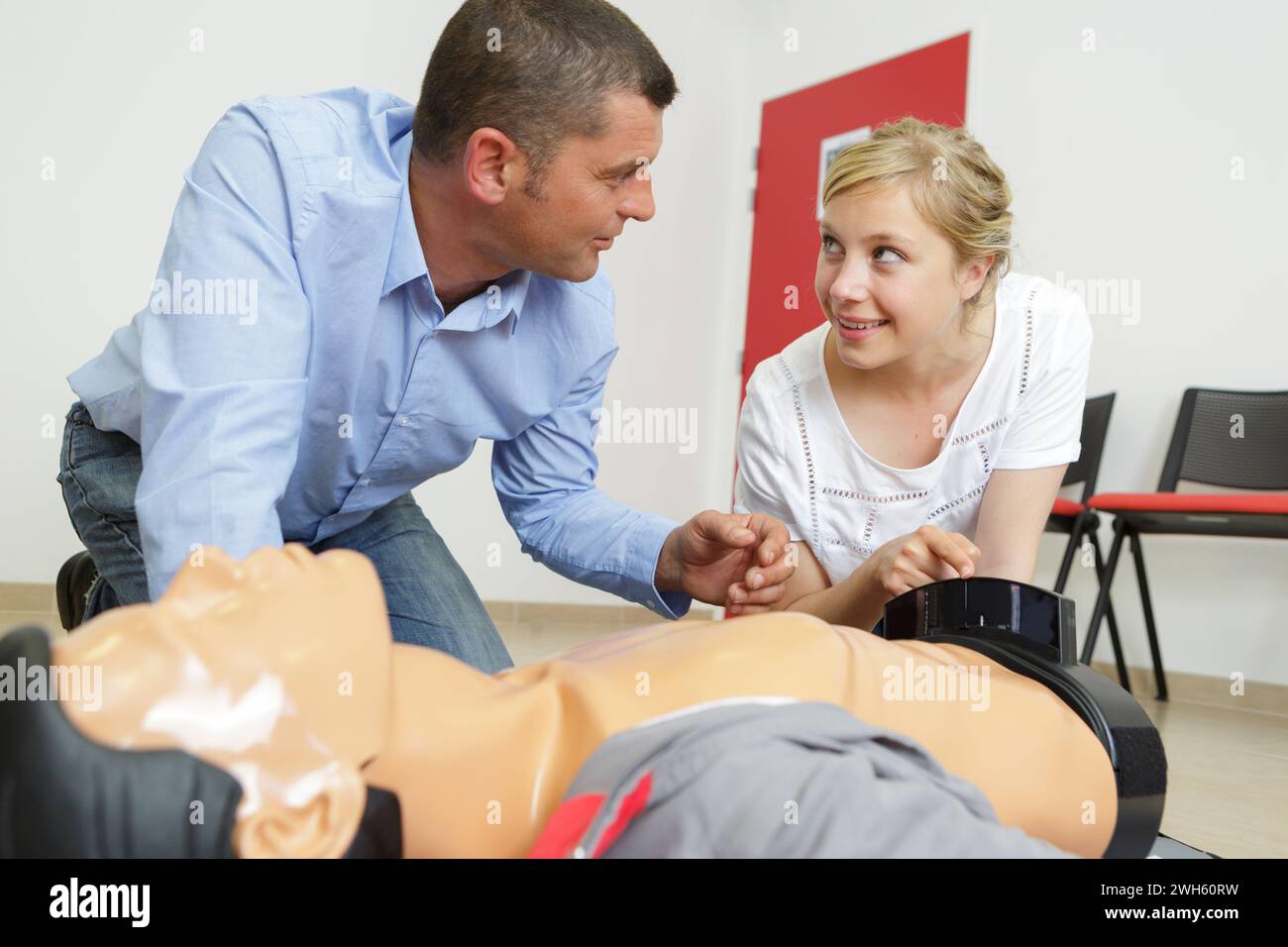 education - first aid training with dummy Stock Photo - Alamy