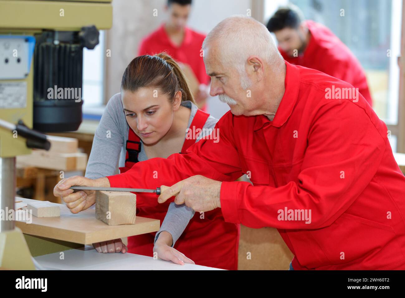 precise polishing a small wooden block Stock Photo - Alamy