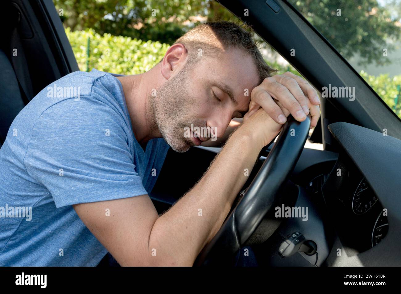 Man asleep in a car hi-res stock photography and images - Alamy