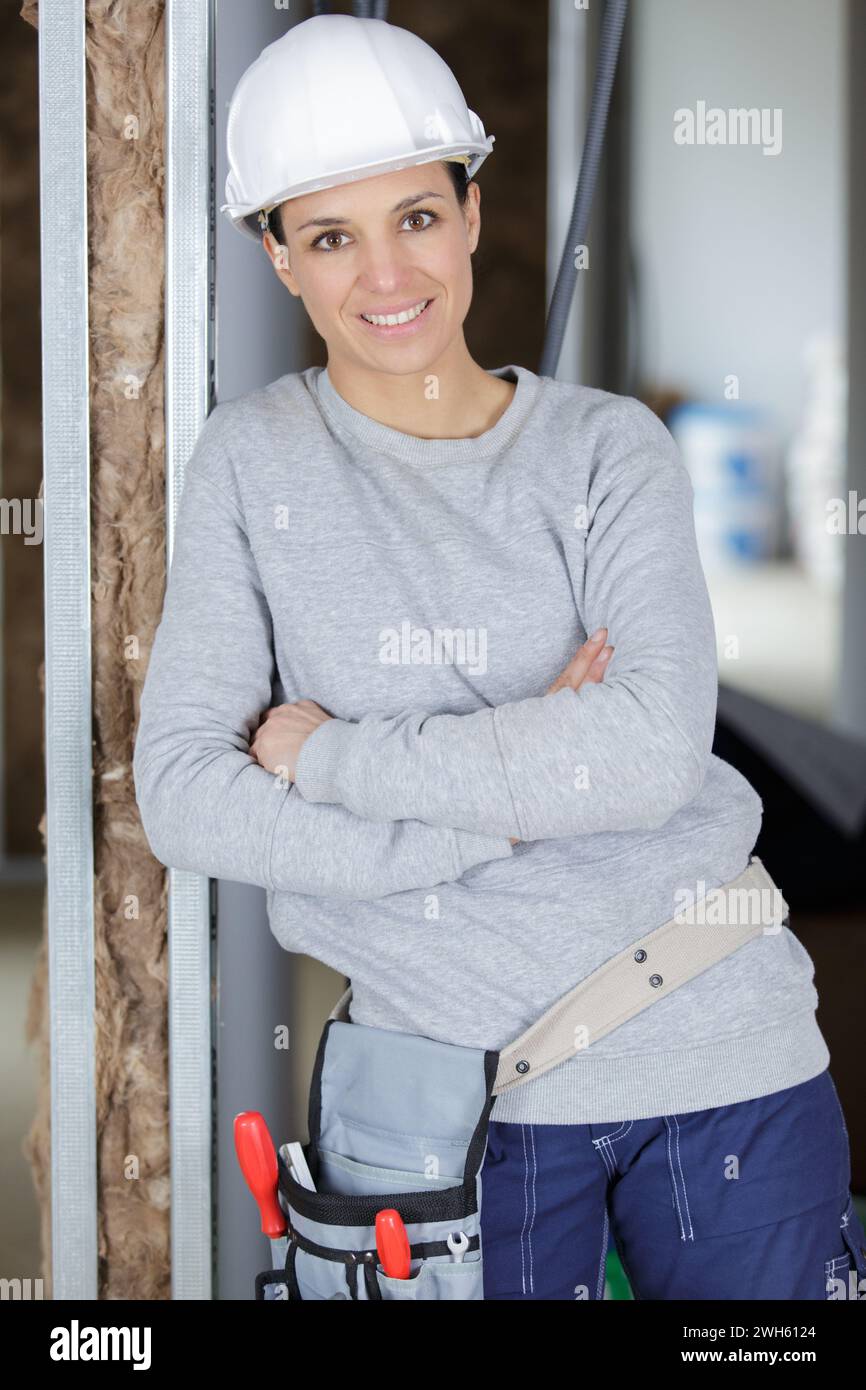 beautiful woman builder posing with blueprints in rolls Stock Photo - Alamy