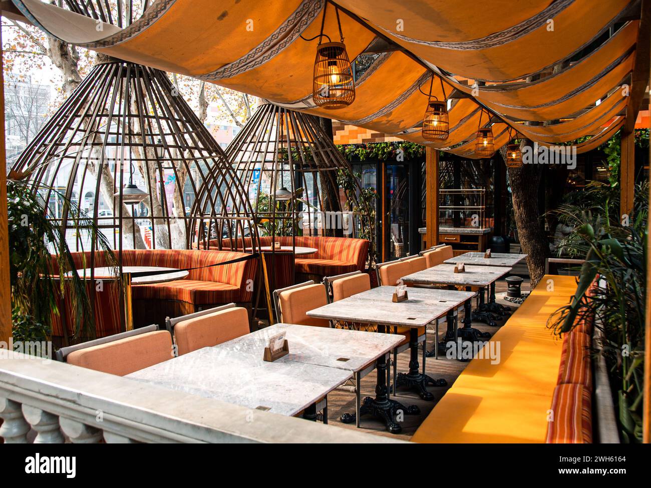 A delicate and elegant outdoor terrace of a cafe Stock Photo - Alamy
