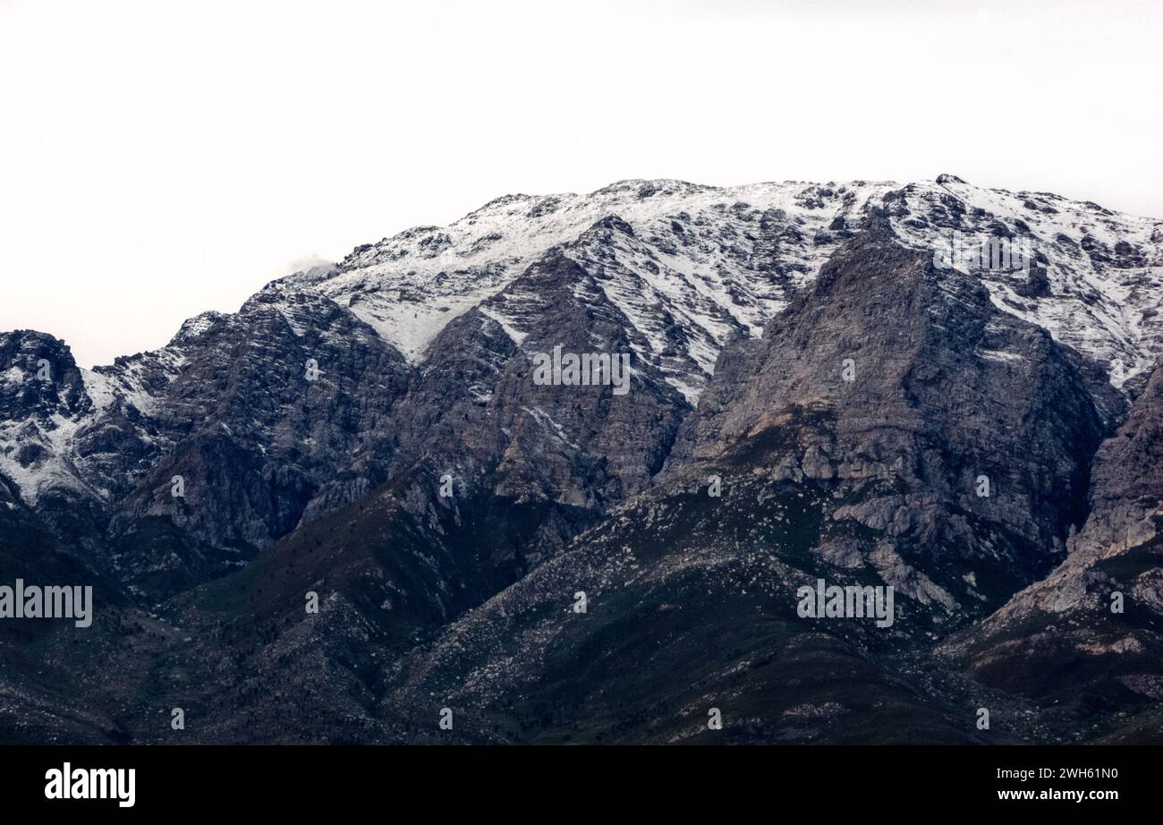The snow-capped peaks of Breede Valley's distant mountains on a chilly ...