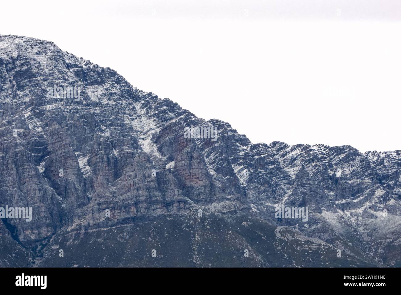 The snow-capped peaks of Breede Valley's distant mountains on a chilly ...