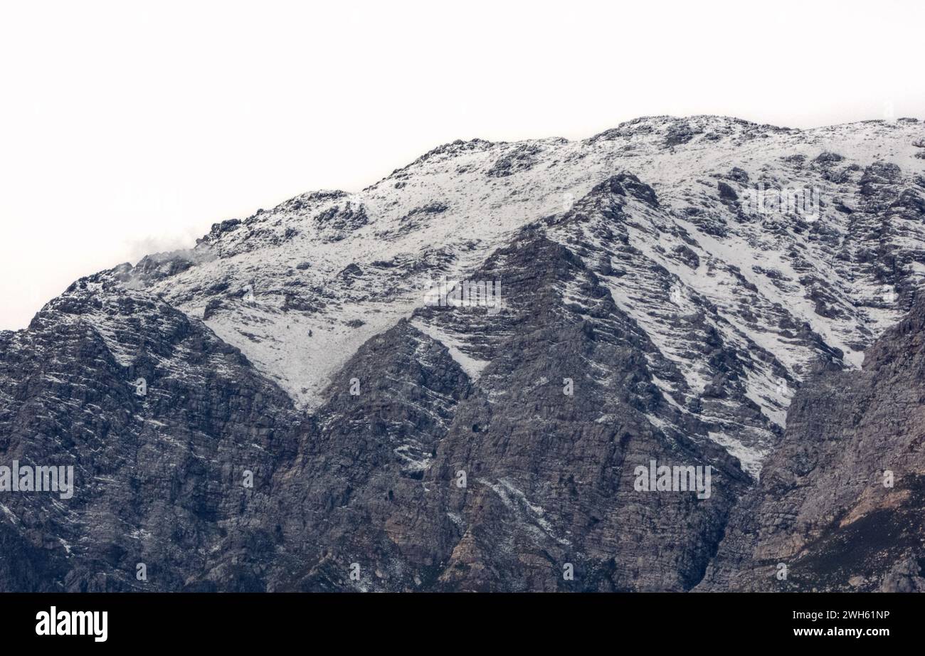 The snow-capped peaks of Breede Valley's distant mountains on a chilly ...