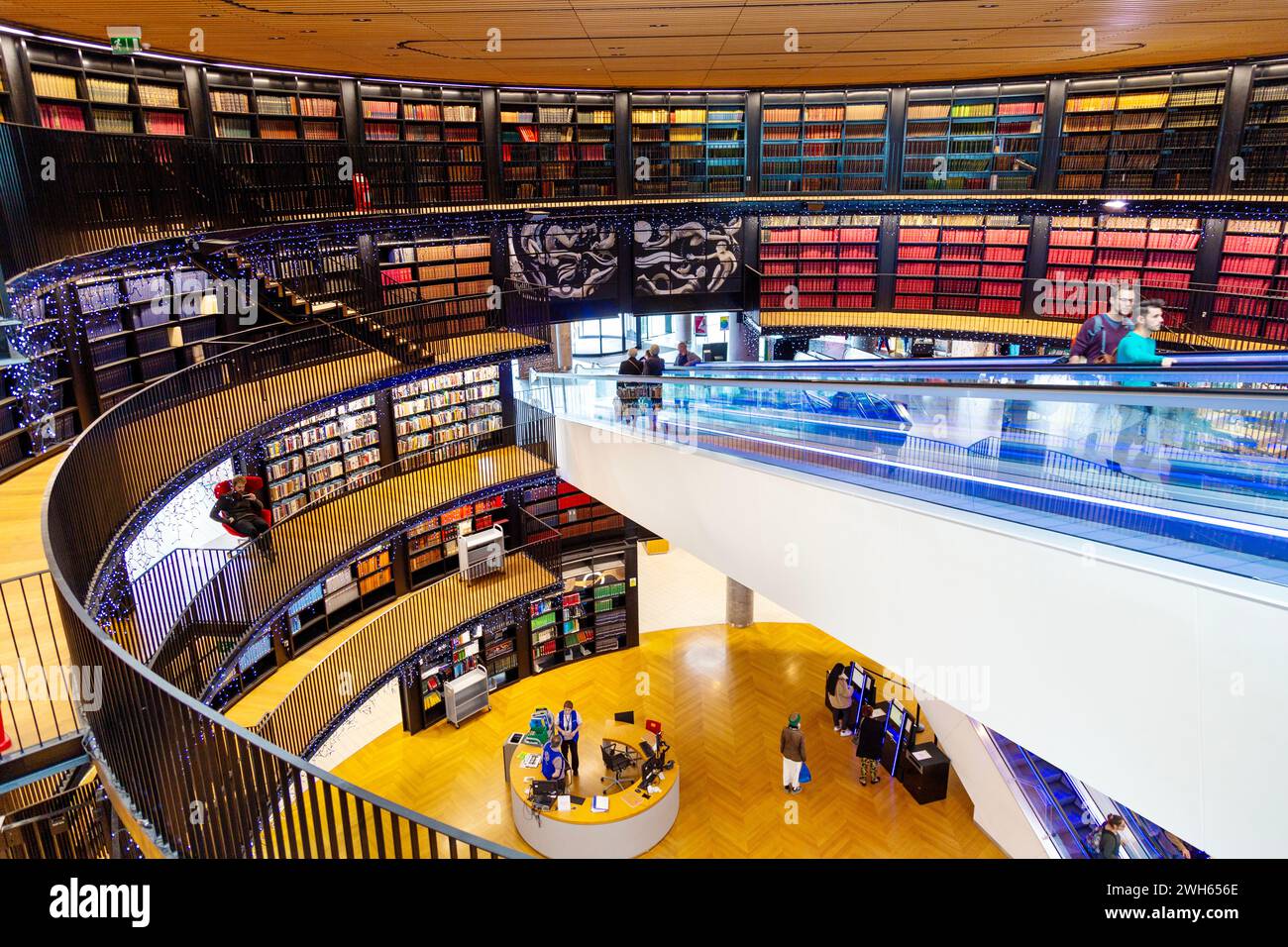 People going on a travelator inside the Birmingham Library, Birmingham ...