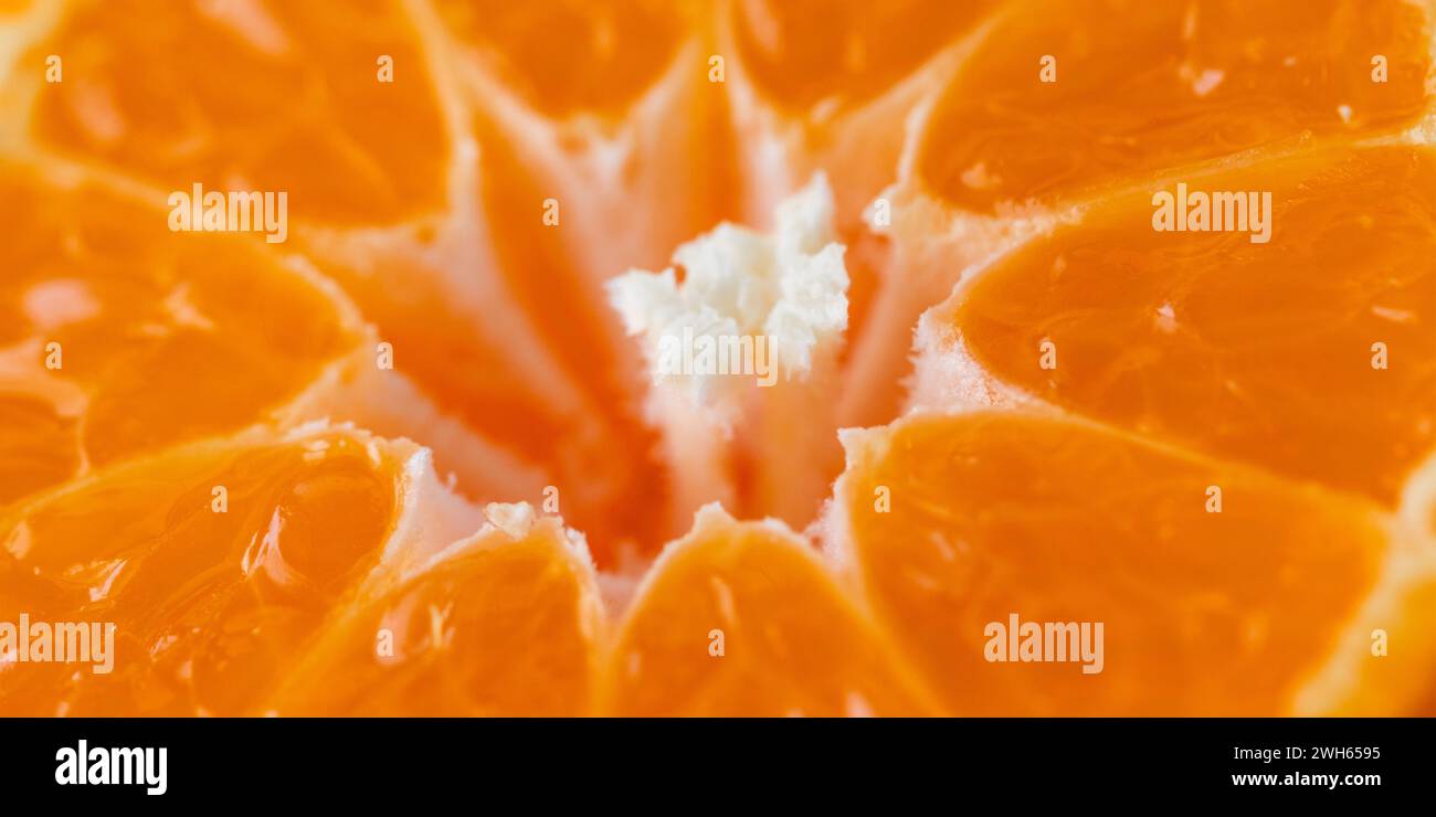 Close-up photo of a tangerine slice. Fruit background Stock Photo - Alamy