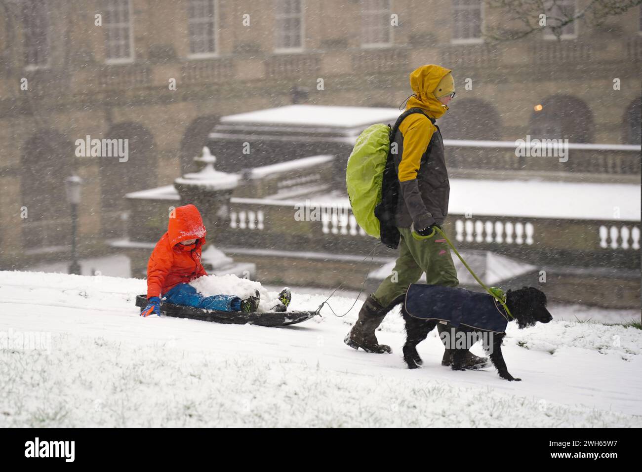 People out enjoying the snow in Buxton, Peak District. Up to 25cm of ...