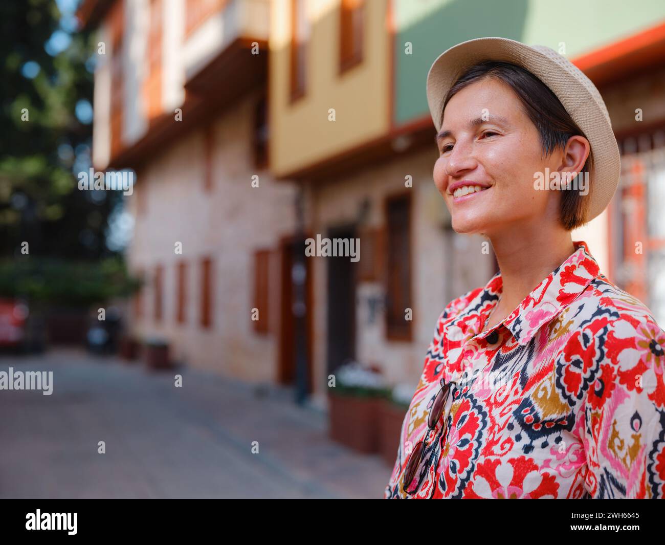 female summer travel to Antalya, Turkey. young asian woman in red dress ...