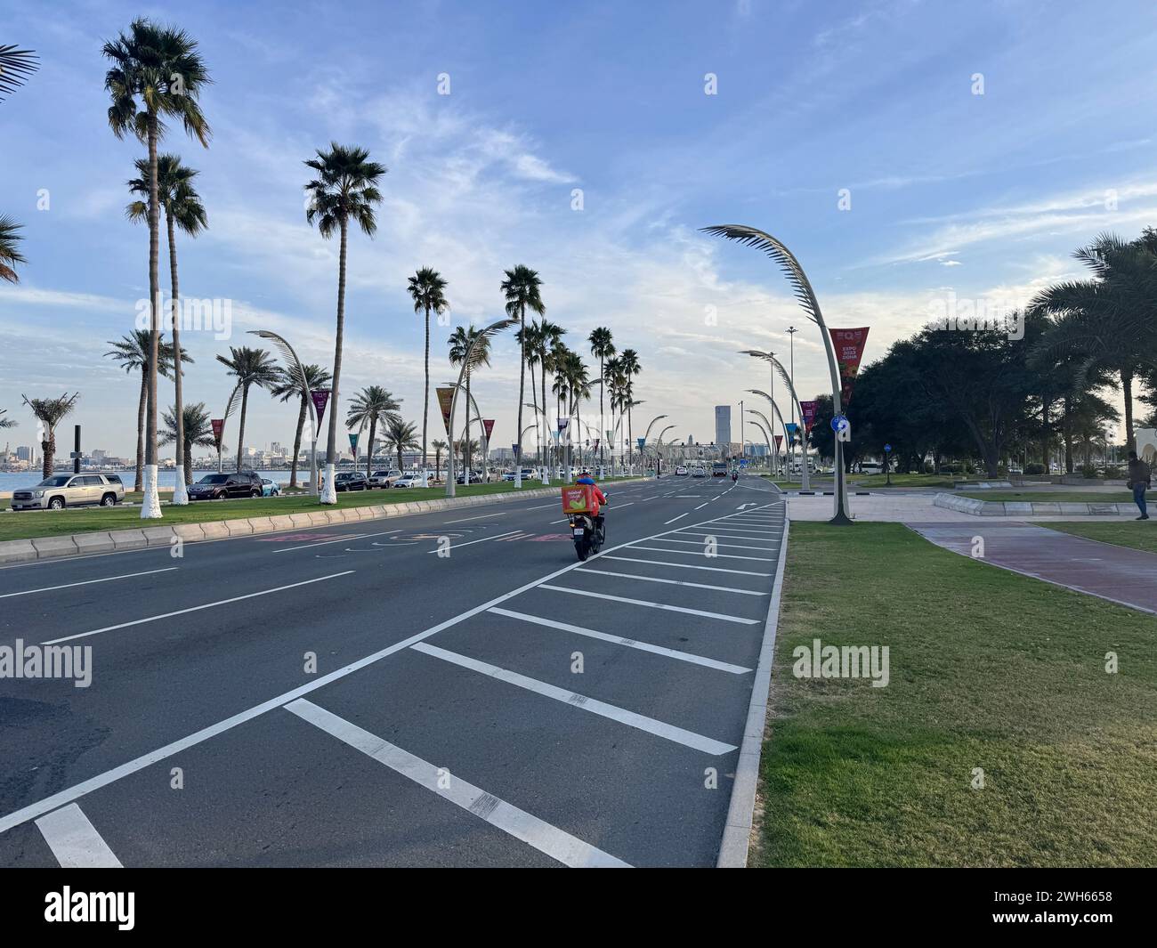 Beautiful view of the Doha corniche Road with blue sky Stock Photo - Alamy