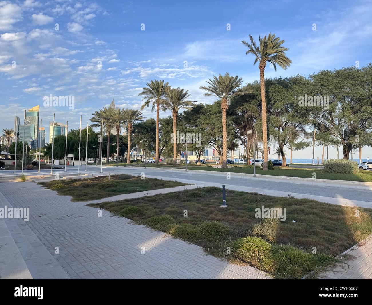 Beautiful view of the Doha corniche Road with blue sky Stock Photo - Alamy