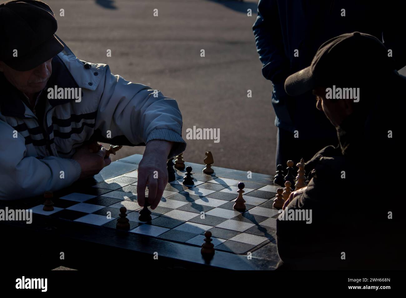 Grandpa playing chess board game hi-res stock photography and images ...