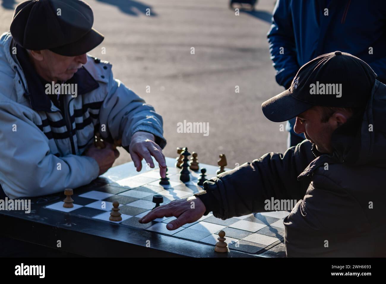 Grandpa playing chess board game hi-res stock photography and images ...