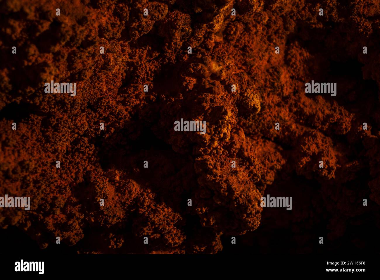 Journey through a vibrant cave adorned with colorful walls, stalactites ...