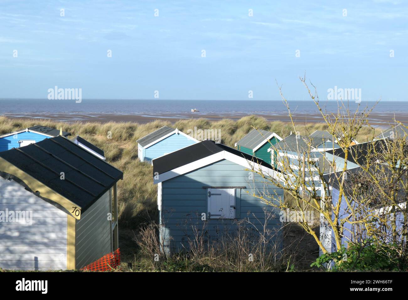 Hunstanton by the sea old shore outside hut huts sand water view views ...