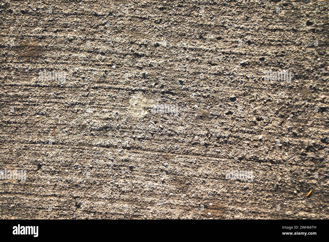 A textured background capturing the gritty and solid surface of ...