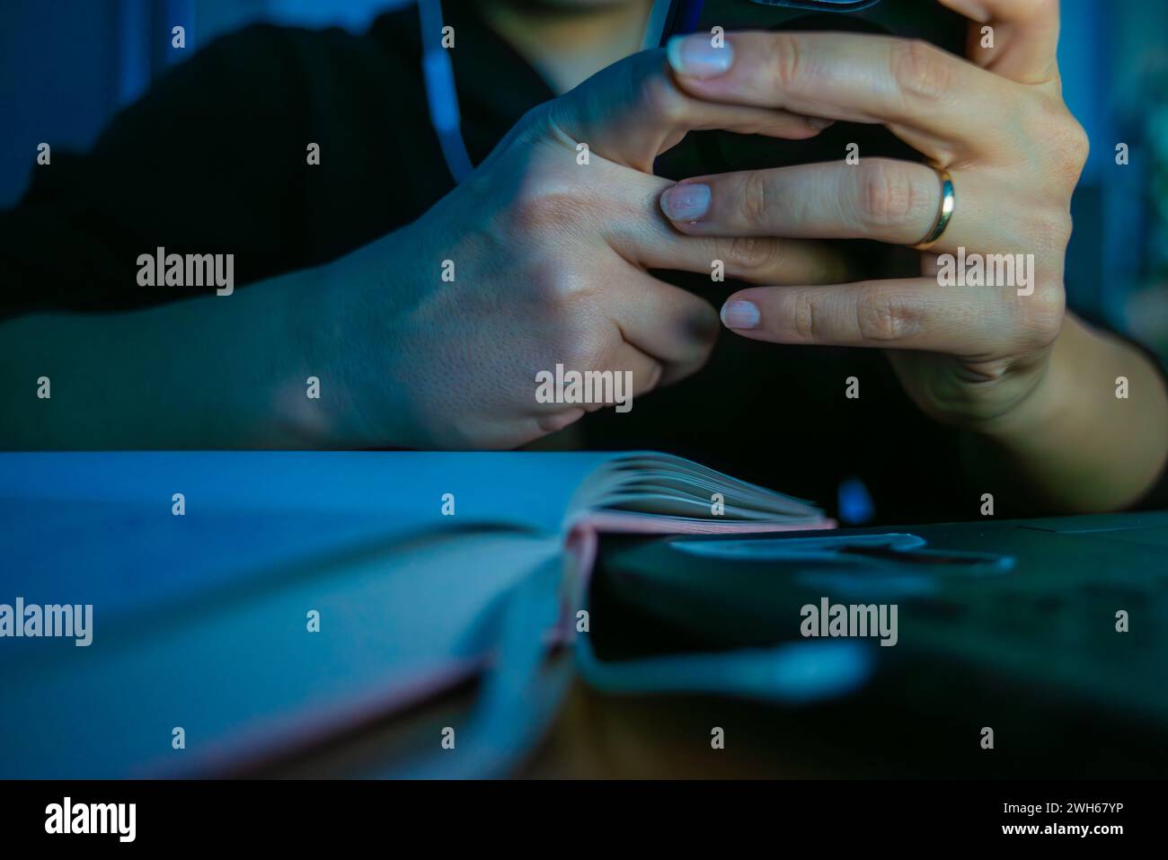 A contemporary businesswoman efficiently handles job tasks, seamlessly ...