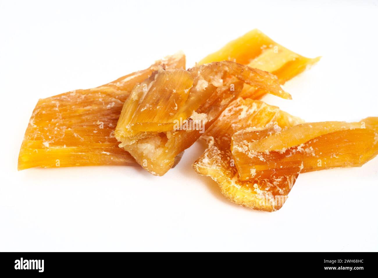 Dried beef tendons for dogs to chew isolated on white with copy space ...