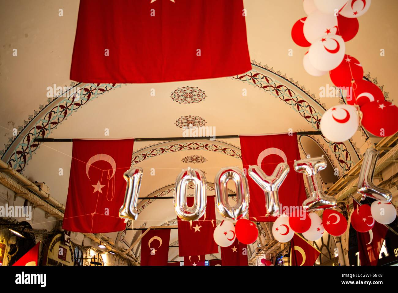 Turkish flags proudly adorn the roof of the bazaar, a vibrant and ...