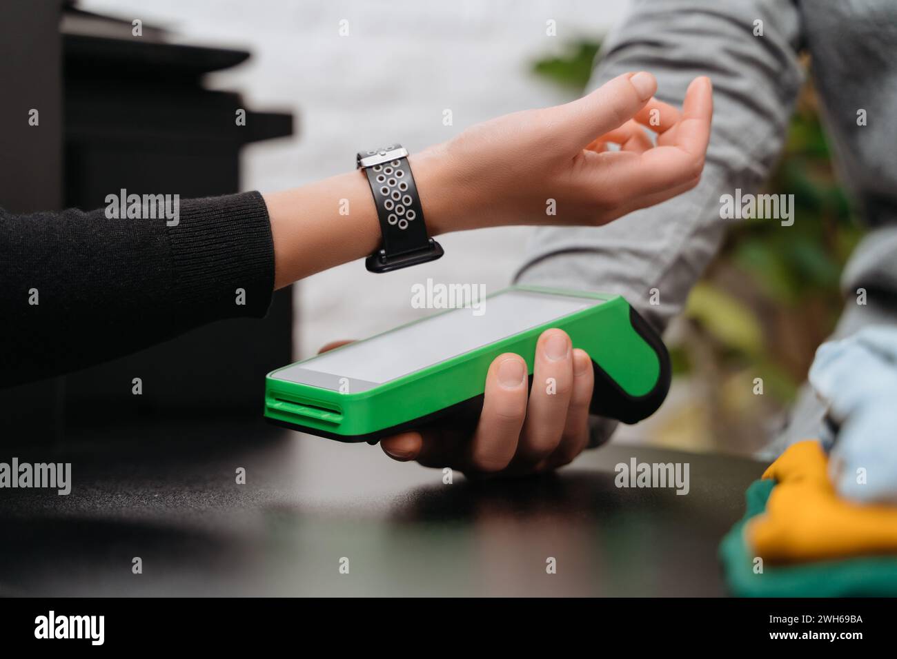 Contactless payment using smartwatch hi-res stock photography and ...