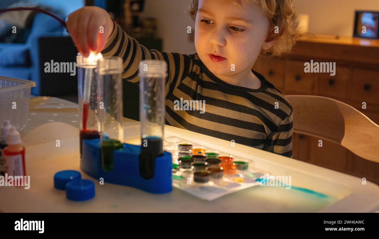 Educational home Learning with chemical experiment for a Caucasian ...