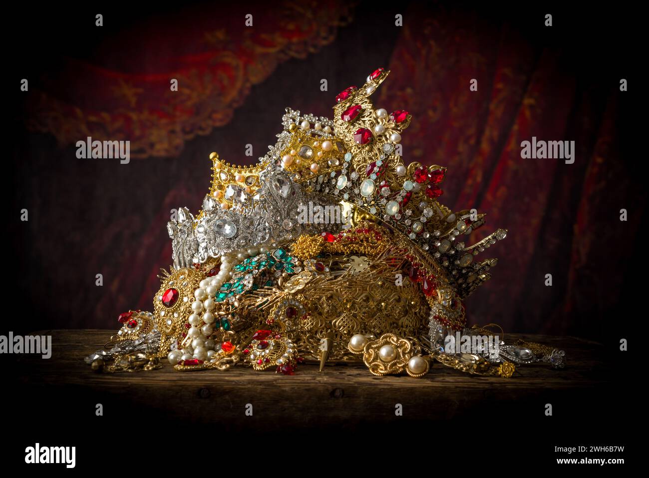 Romantic image of a treasure chest filled with jewellery, precious gems ...