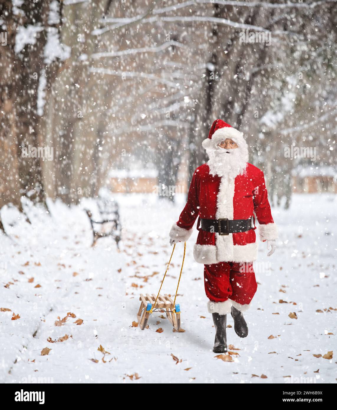 Santa pulling full sleigh hi-res stock photography and images - Alamy