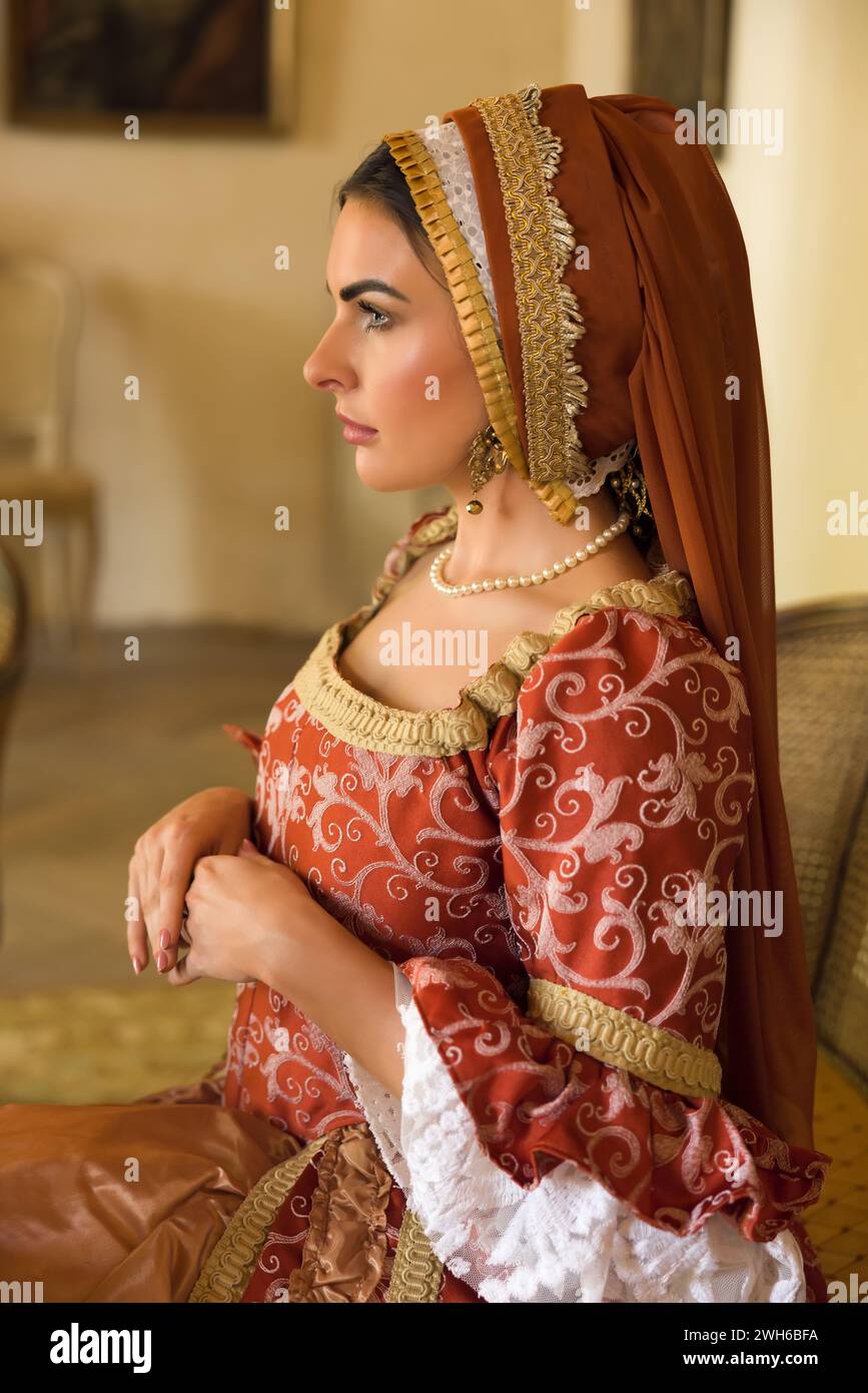 Closeup portrait of a lady in authentic renaissance dress and matching ...