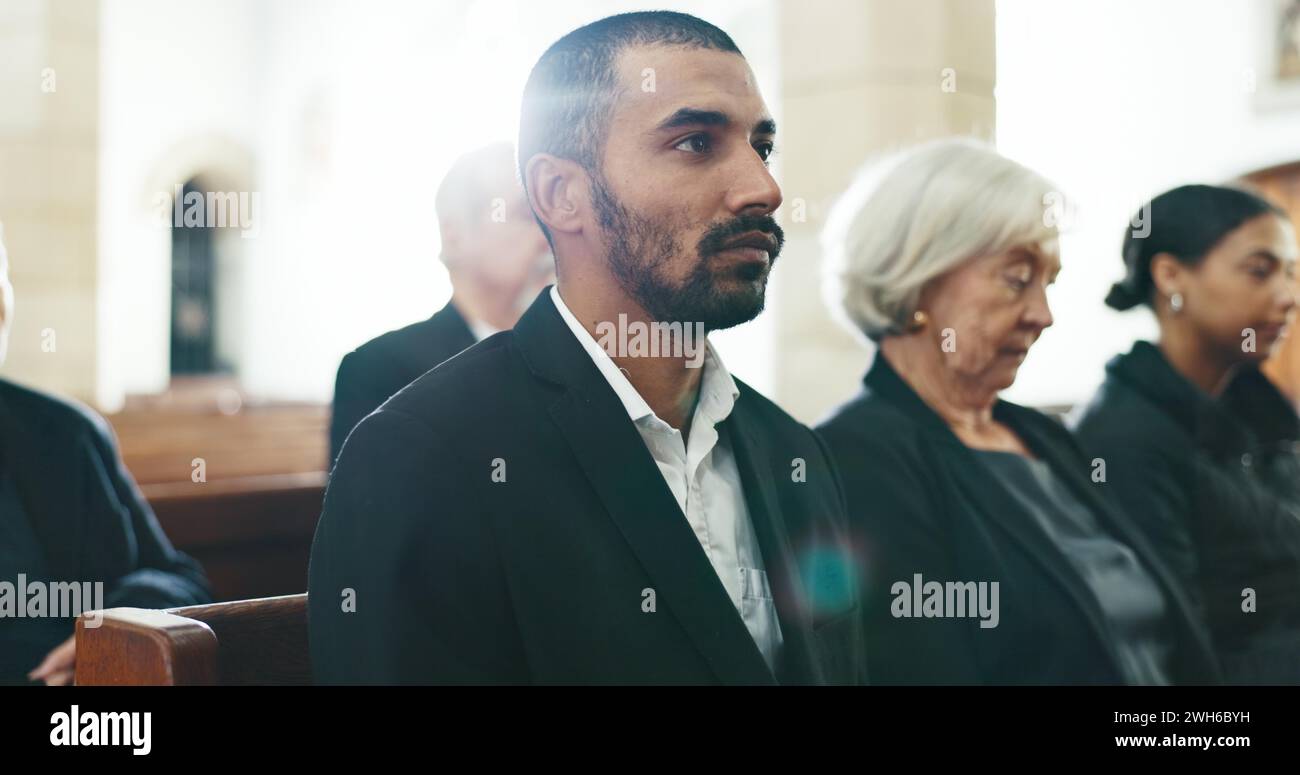 Sad, man and face closeup with depression at a funeral in church for ...