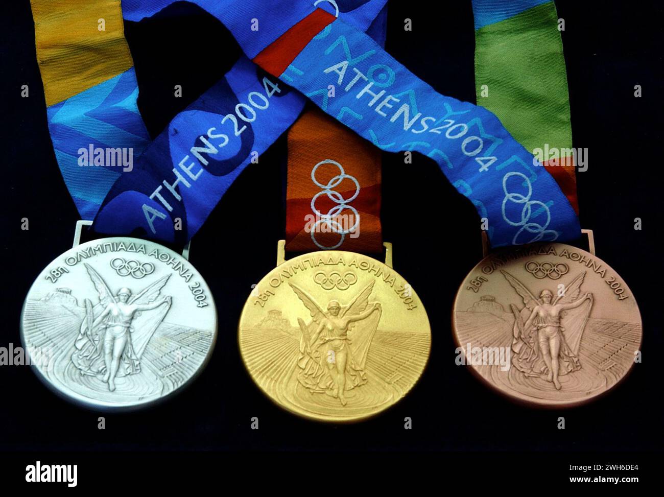 FILE - The silver, left, the gold, center, and the bronze Olympic ...