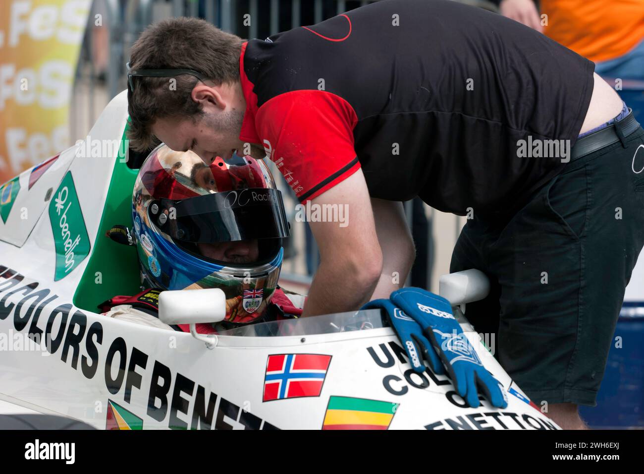 Close-up of Driver being strapped into a 1985, Toleman TG185 during the ...