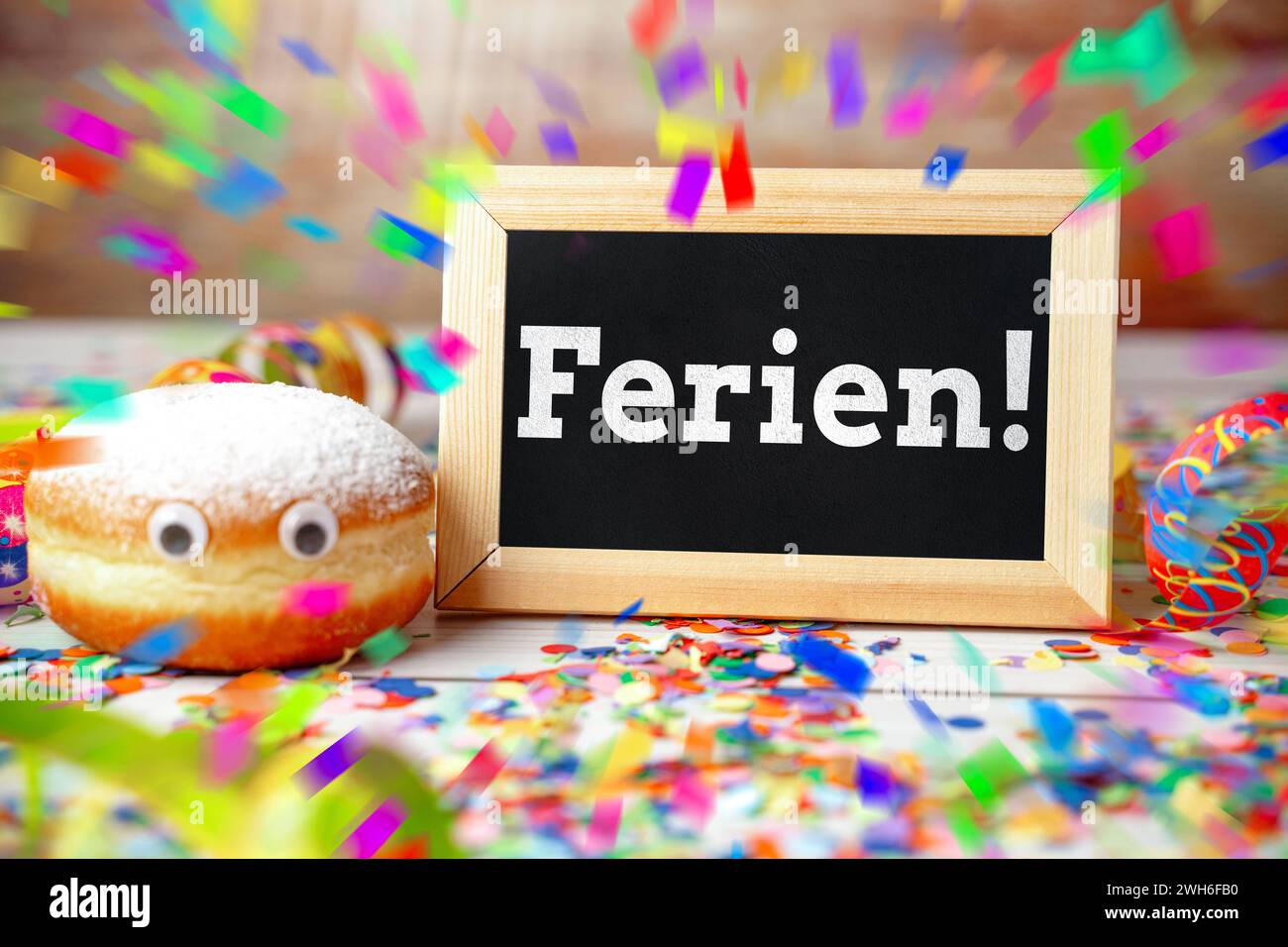 8 February 2024: Vacation Inscription on a sign next to a doughnut with ...