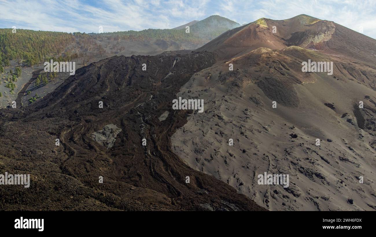 aerial drone view of volcano with lava flow and its crater Stock Photo ...