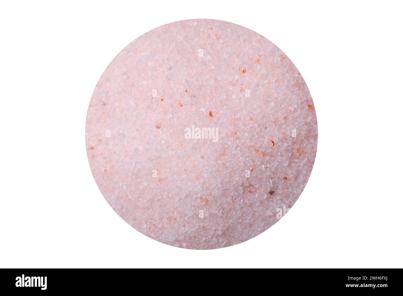 Fine pink Himalayan table salt in a ceramic bowl on a dark concrete ...