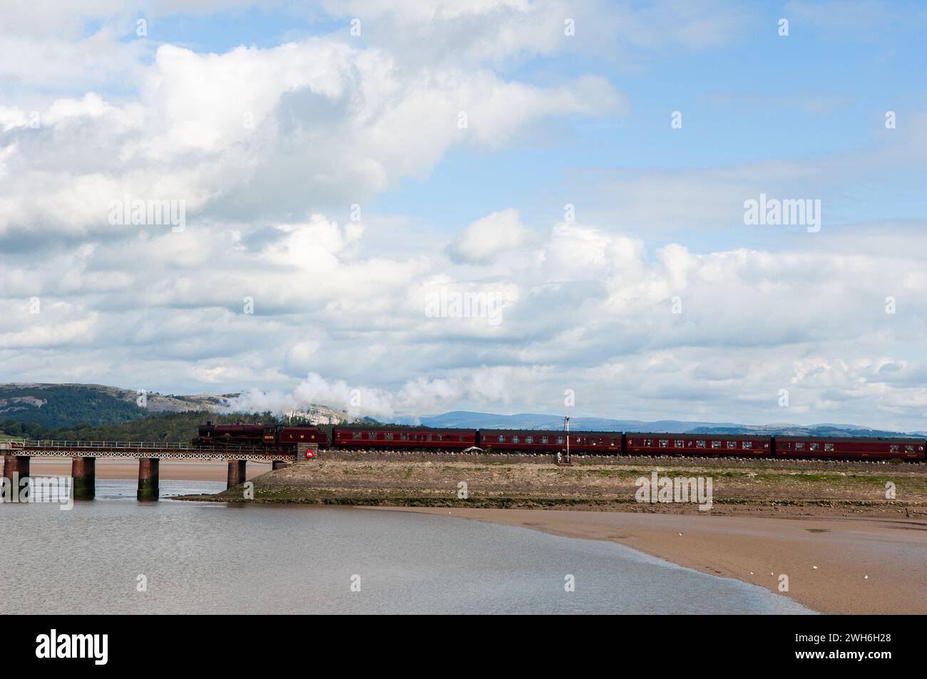 A steam train crossing Arnside Viaduct, Arnside, Cumbria, England Stock ...