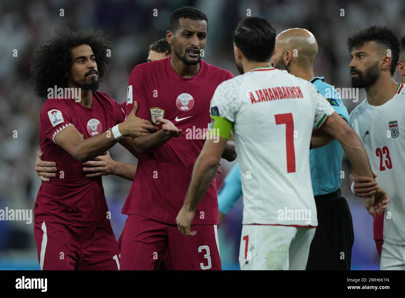 DOHA, QATAR - FEBRUARY 07: Alireza Jahanbakhsh of Iran argue with Akram ...