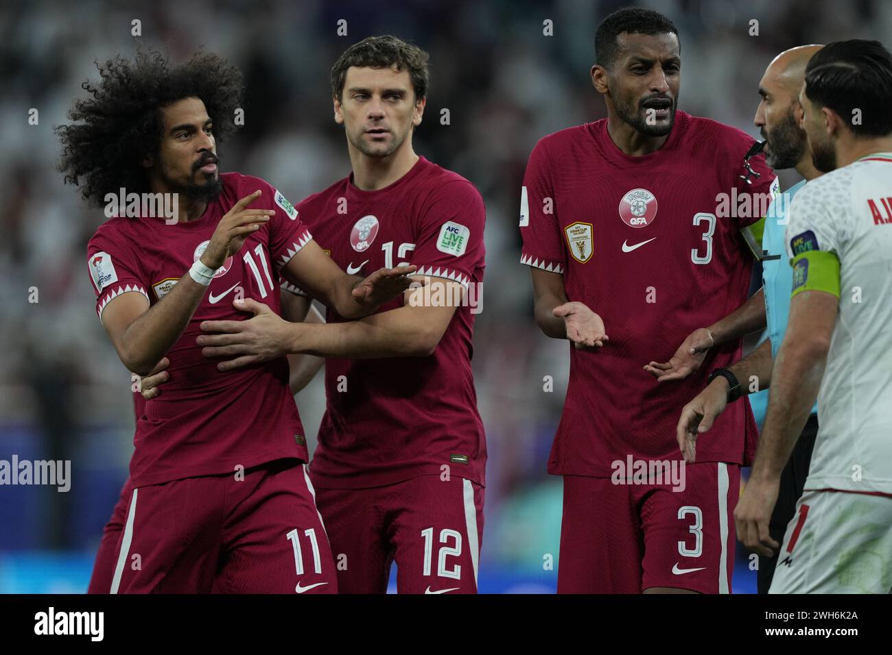 DOHA, QATAR - FEBRUARY 07: Alireza Jahanbakhsh of Iran argue with Akram ...