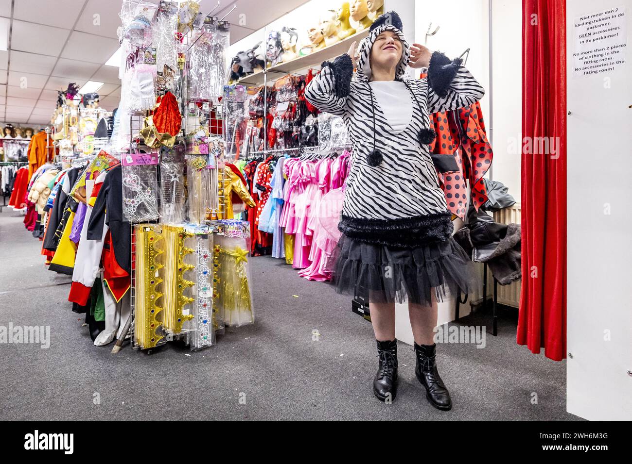 MAASTRICHT - A customer in a carnival shop in the center of Maastricht ...