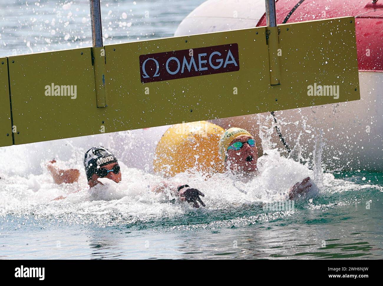 Doha, Qatar. 8th Feb, 2024. Kyle Lee (R) of Australia competes during ...