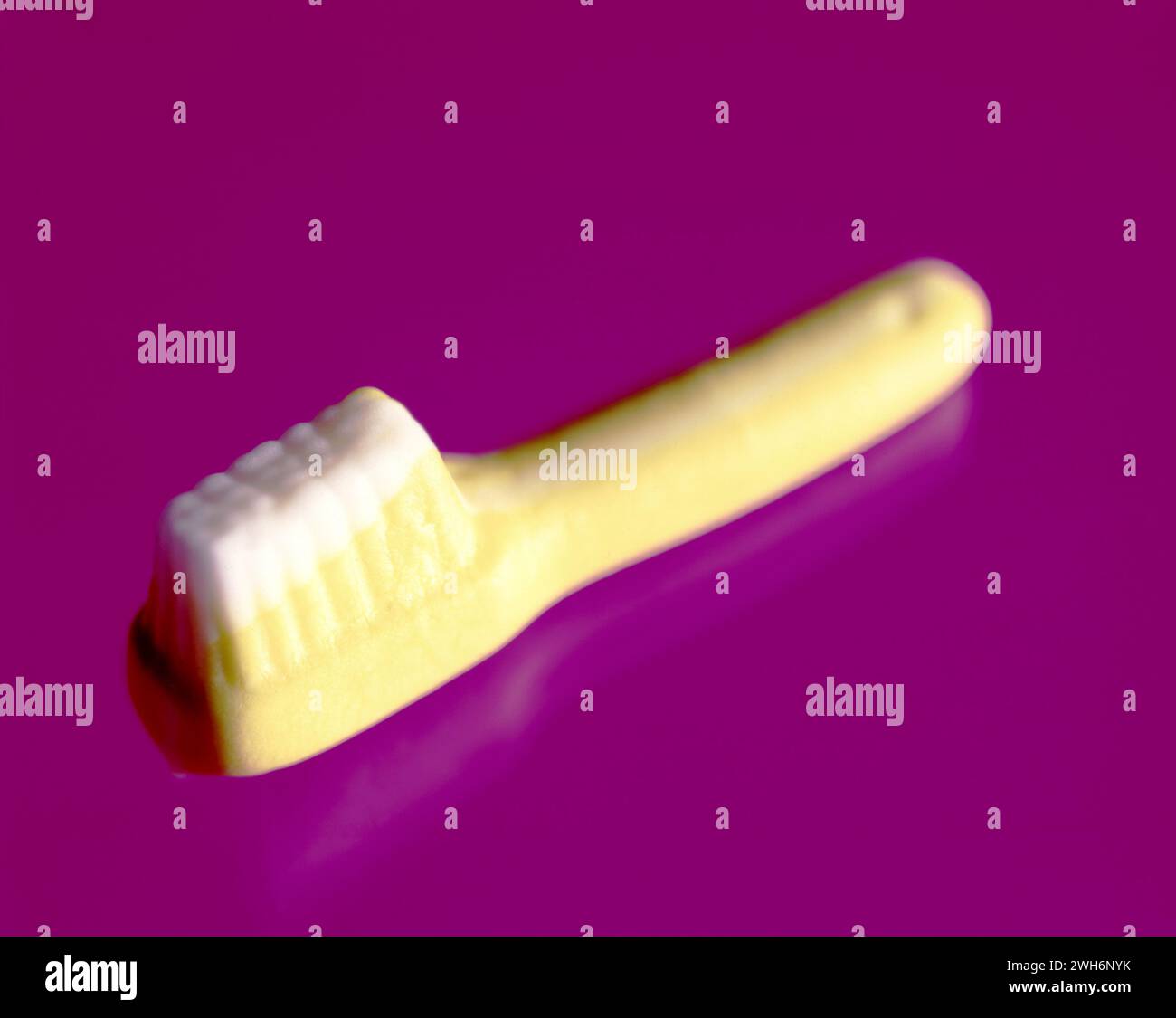sweet toothbrush confectionery isolated on pink background, sweet ...