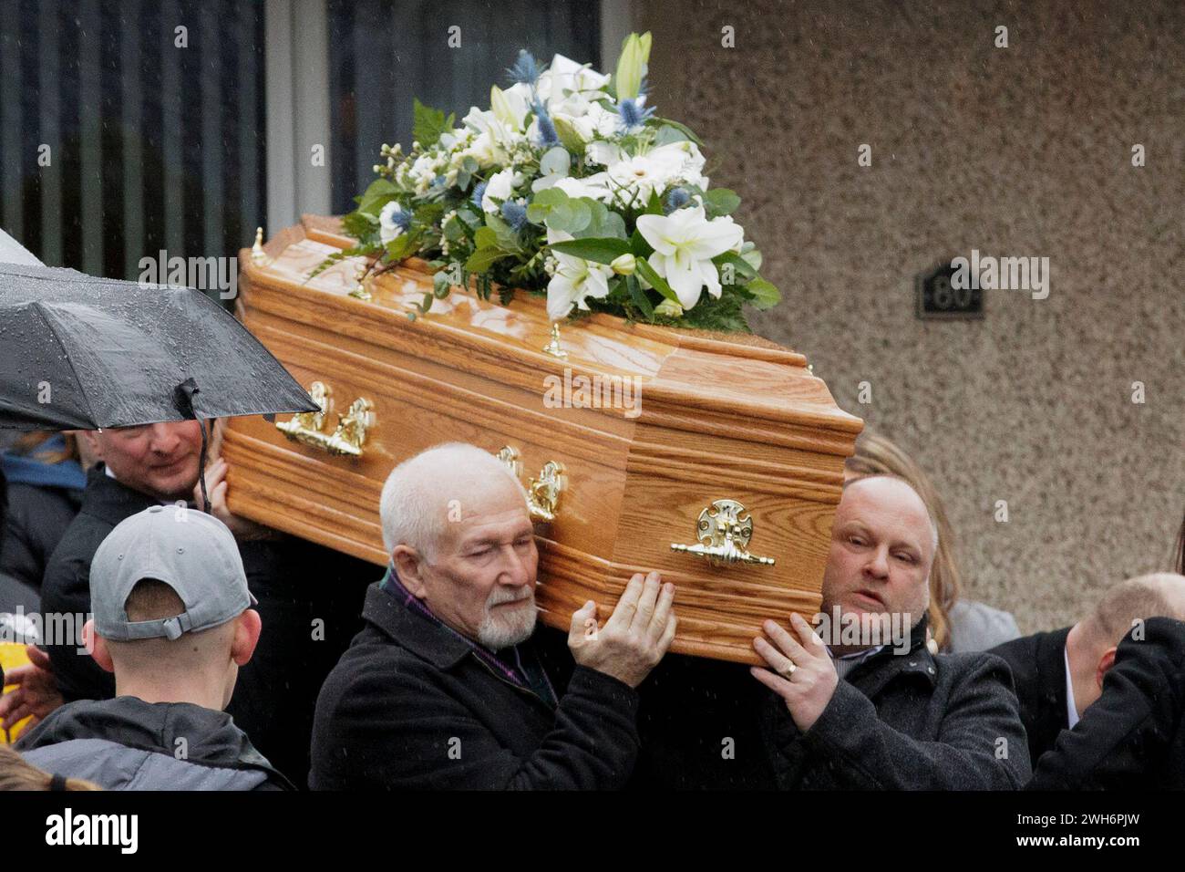 The coffin of Blake Newland is carried out of the home of his ...