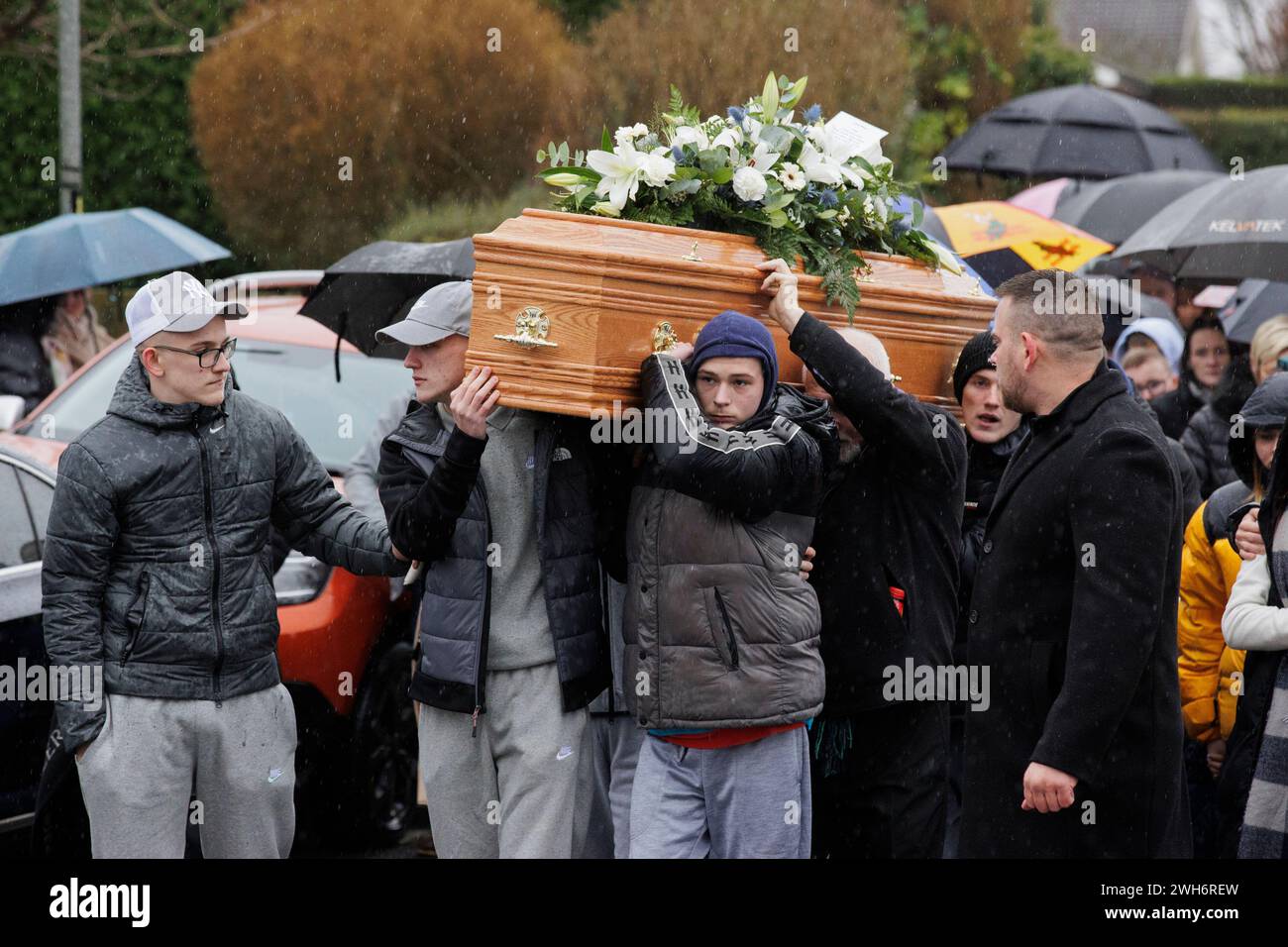 The coffin of Blake Newland is carried out of the home of his ...