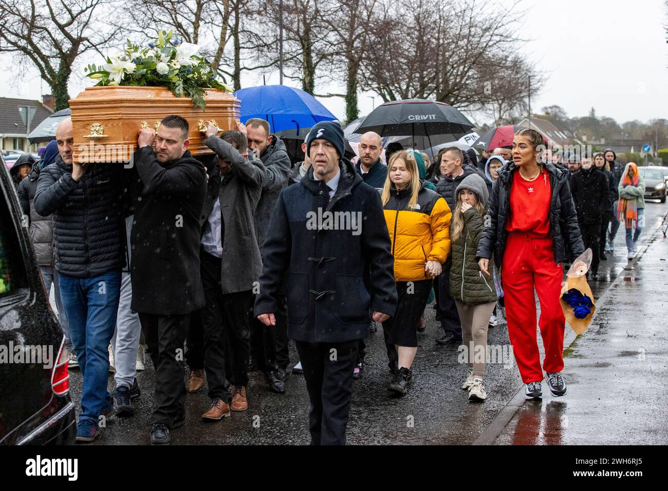 The coffin of Blake Newland is carried out of the home of his ...