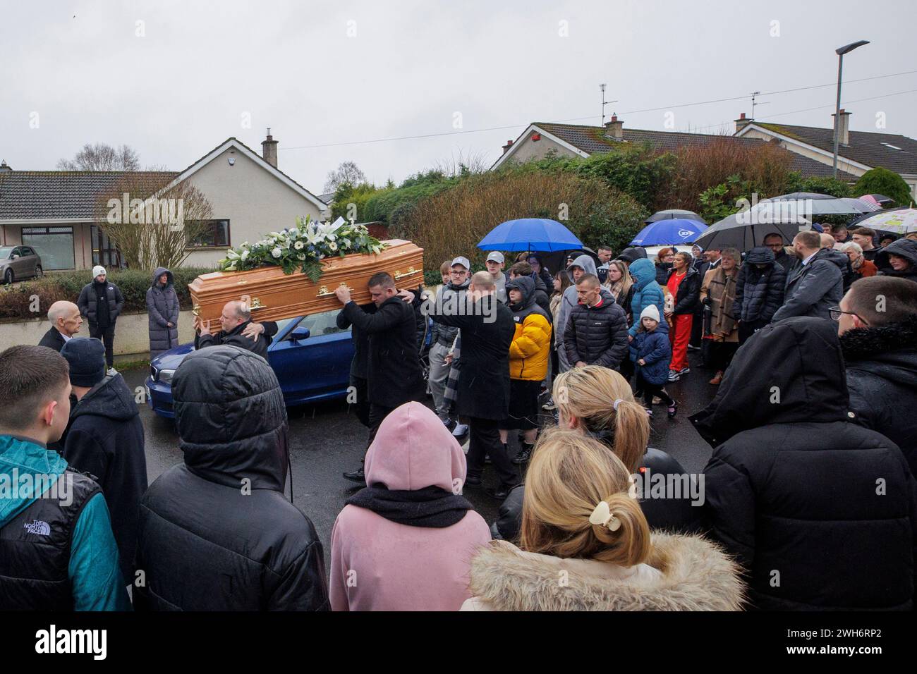 The coffin of Blake Newland is carried out of the home of his ...